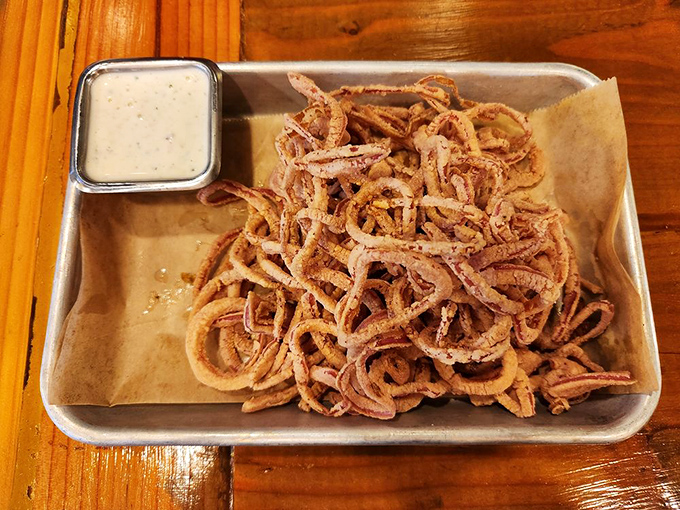 Crispy onion strings that crunch like nature's potato chips. The perfect bar snack for between pizza slices.