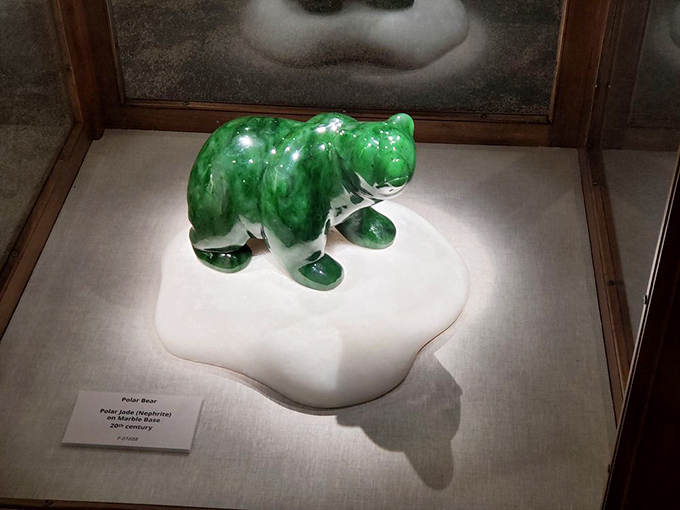 This jade polar bear standing on carved alabaster ice proves that even before Coca-Cola ads, polar bears had mastered the art of looking adorable.