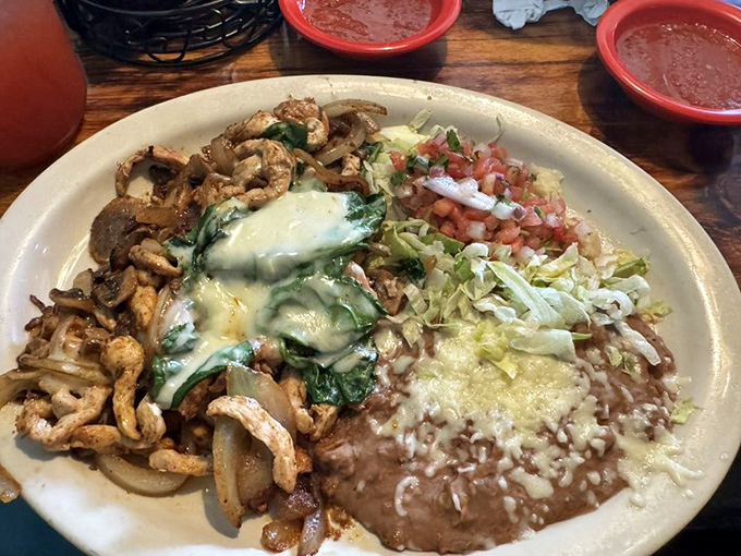 A plate that doesn't just feed you&mdash;it tells a story. Grilled chicken, melted cheese, and fresh vegetables creating a narrative worth savoring until the last bite.