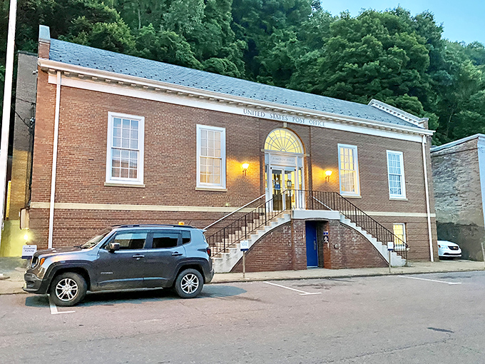 The Post Office stands as solid as the institution itself&mdash;brick, symmetry, and those warm lights saying "come on in, we've got your mail."