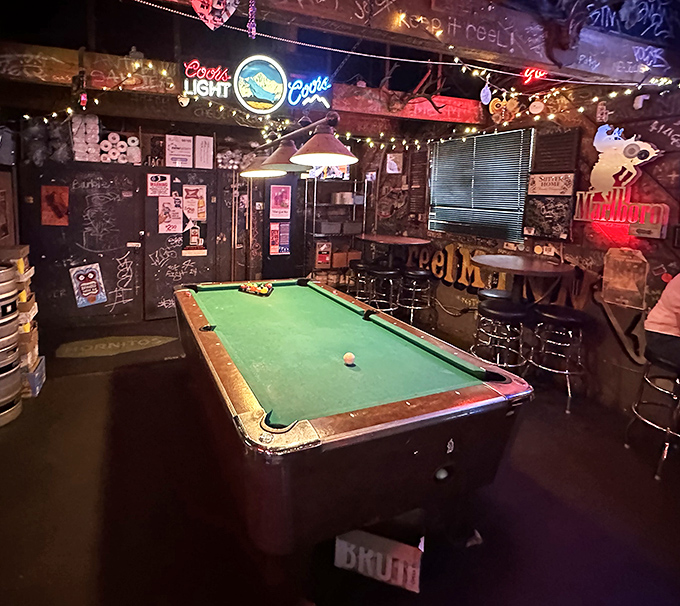 The pool table: where strangers become friends and friends become rivals. All while the aroma of fried chicken teases from the kitchen.