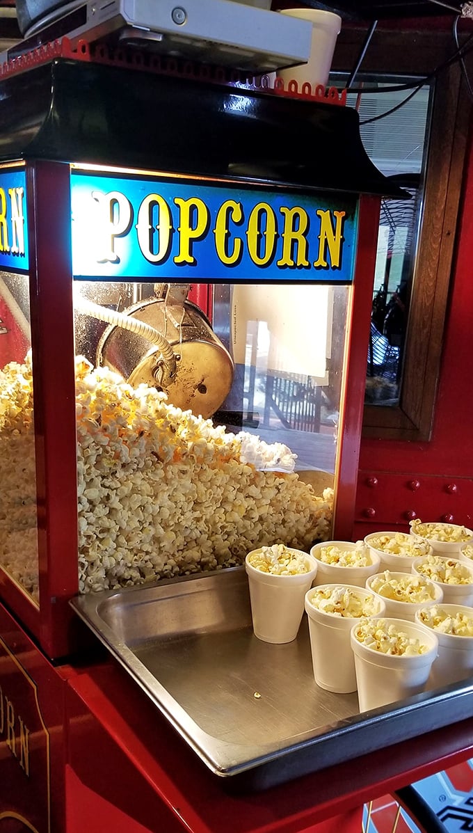 Fresh popcorn pops away, creating a carnival atmosphere that makes waiting for your burger feel like the best kind of anticipation.