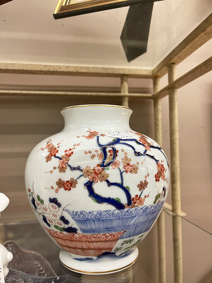 This delicate porcelain vase tells stories of distant artisans and would look suspiciously perfect on that empty shelf in your dining room.