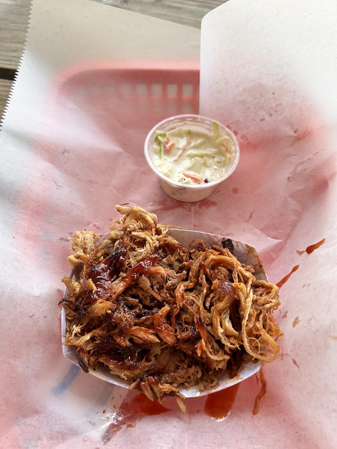 Pulled pork in its purest form&mdash;no pretense, no gimmicks, just strands of smoky perfection waiting for their sauce baptism.