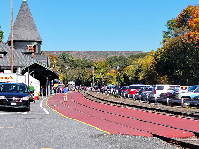 The station platform's distinctive red surface serves as a literal red carpet, welcoming visitors to their starring role in a Pennsylvania adventure.