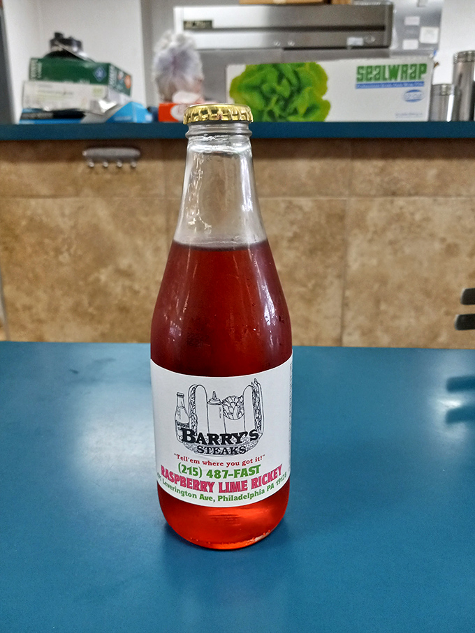 The Raspberry Lime Rickey—liquid refreshment that cuts through richness like a comedian slicing through awkward silence. The perfect sandwich sidekick.