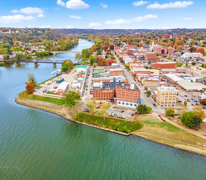 Autumn paints Marietta in spectacular colors, with the river reflecting the town's historic buildings in a double feature of scenic beauty.