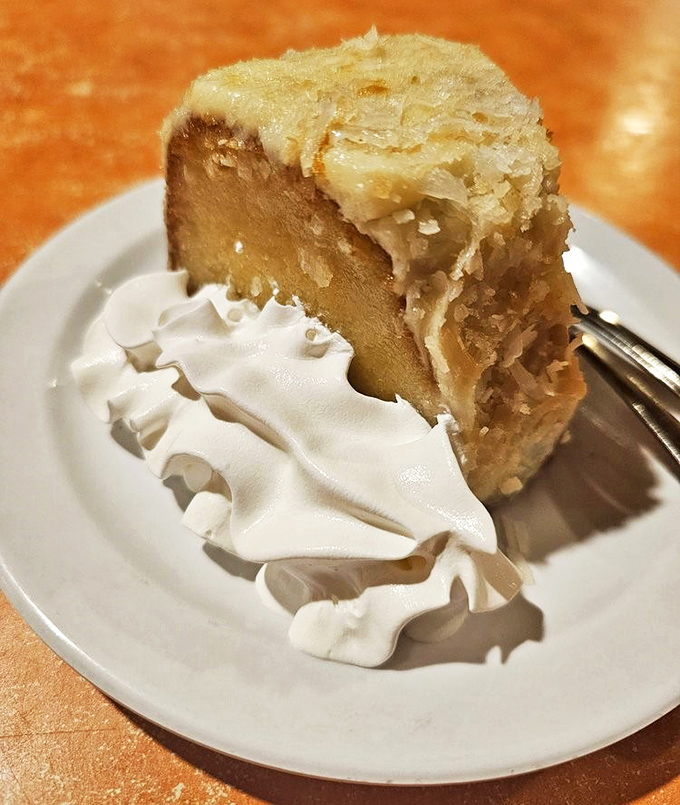 The coconut rum cake&mdash;where tropical flavors and comfort desserts collide in a sweet finale that makes you consider ordering a second slice.