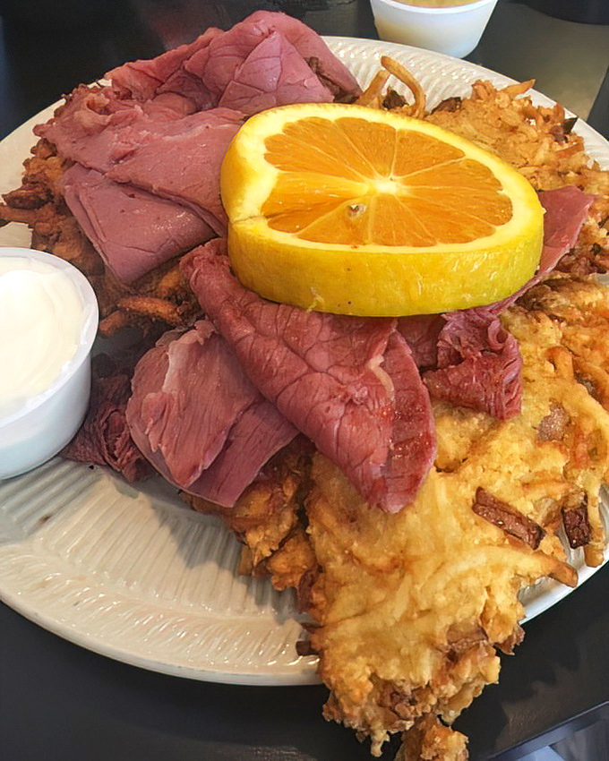 Meat the champion of breakfast platters. This hearty hash brown foundation topped with generous corned beef is the morning fuel serious eaters require.