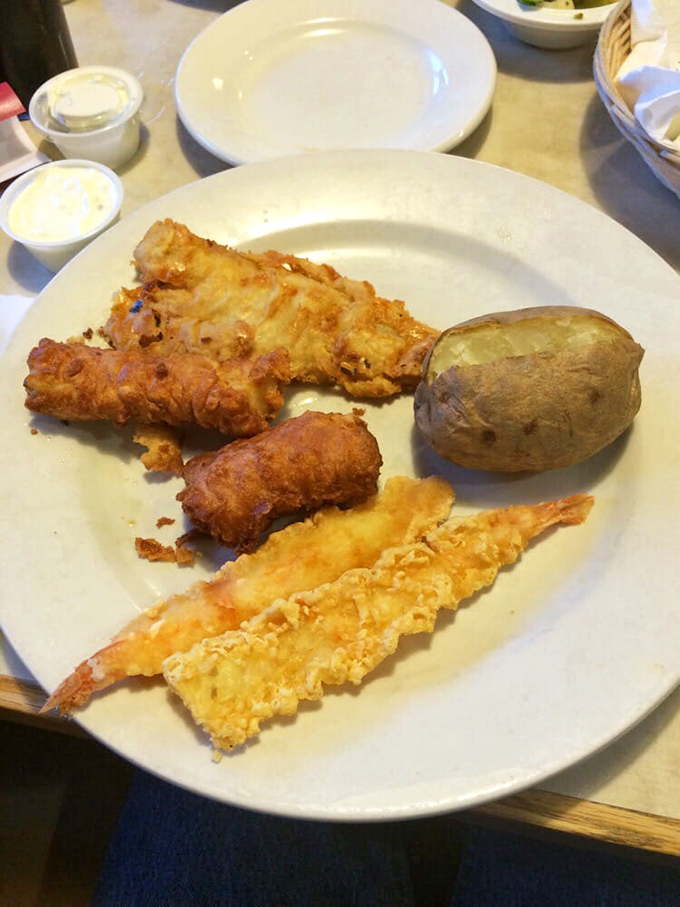 A seafood and chicken platter that answers the eternal question: "Why choose one when you can have it all?"