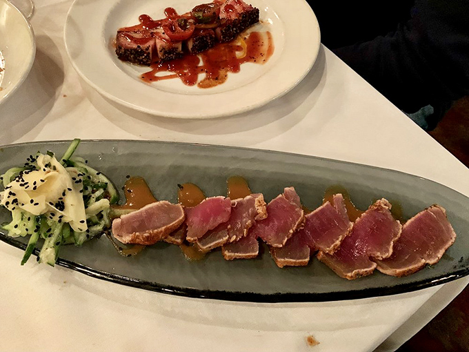 Seared tuna that's dressed better than most people at the table&mdash;rare in the middle with a perfectly tailored crust.