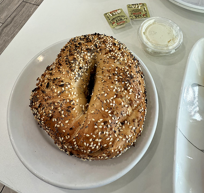 The everything bagel &ndash; where sesame and poppy seeds unite in perfect harmony on a chewy ring of dough that New York expats approve of.