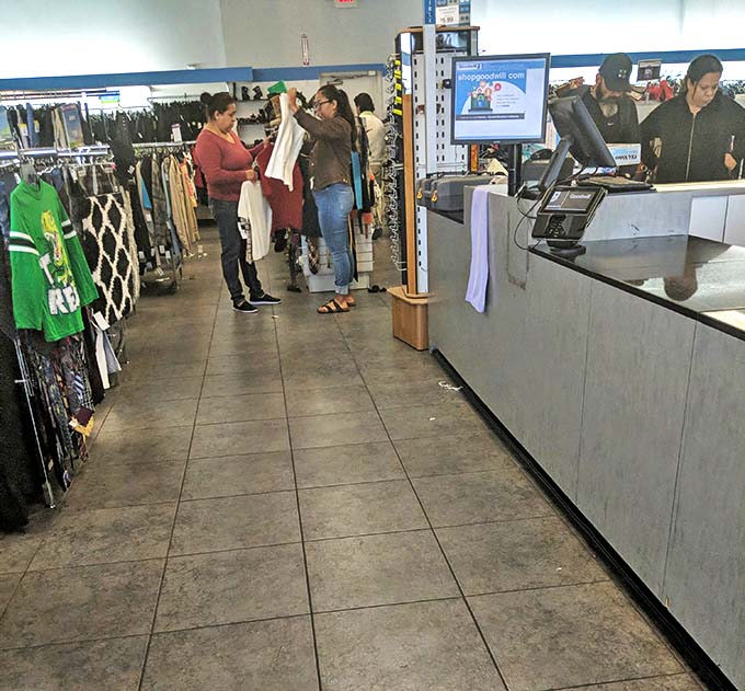 The checkout area buzzes with the energy of successful hunters comparing their finds. That green jersey might be someone's new game day uniform.