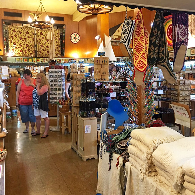 Browsing becomes an adventure as visitors navigate through a wonderland of quilts, crafts, and collectibles that transform souvenirs into keepsakes.