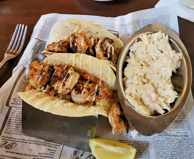 These shrimp tacos aren't just a meal – they're a coastal vacation wrapped in a tortilla, with coleslaw providing the perfect creamy contrast.