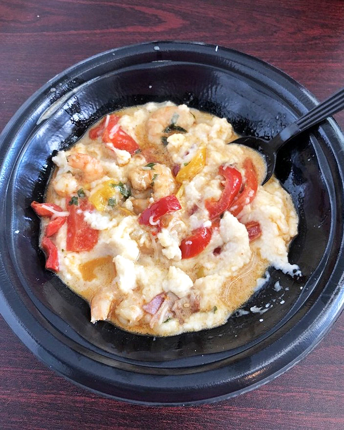 This shrimp and grits dish doesn't just satisfy hunger; it resolves existential crises about whether comfort food can also be sophisticated.