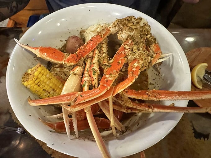 Snow crab legs sprawling dramatically across the plate like they're auditioning for a seafood calendar. The struggle with the shell is worth every sweet, tender morsel.