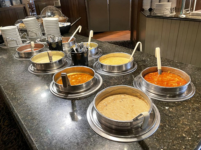 A symphony of soups simmering in their stations. Each ladle dip reveals a different Lancaster County story told through broth and ingredients.