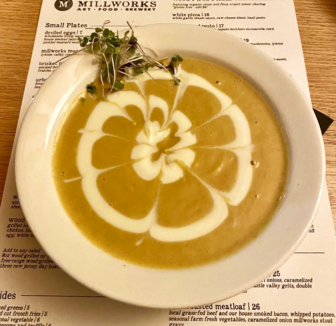 Soup as performance art&mdash;that cream swirl deserves a standing ovation. Proof that vegetables can be both virtuous and decadent.