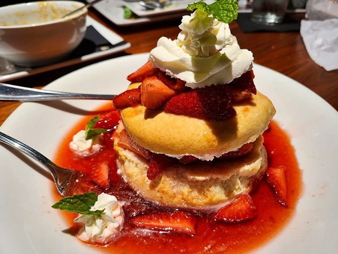 A strawberry shortcake that defies gravity and good sense. Layer upon layer of sweet rebellion against the notion that dessert should be sensible.