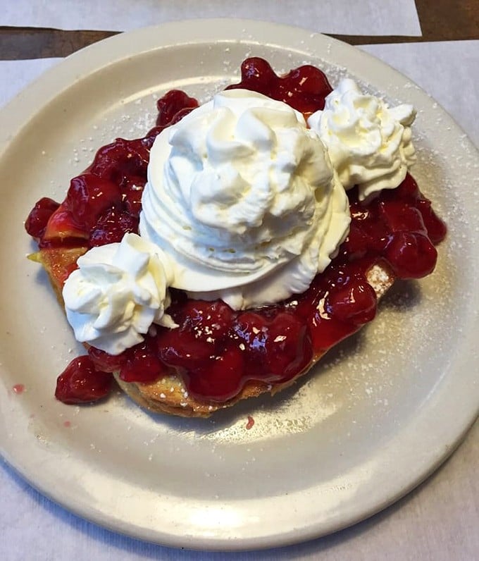 Stuffed French toast crowned with strawberries and whipped cream &ndash; breakfast that boldly crosses the line into dessert territory without apology.