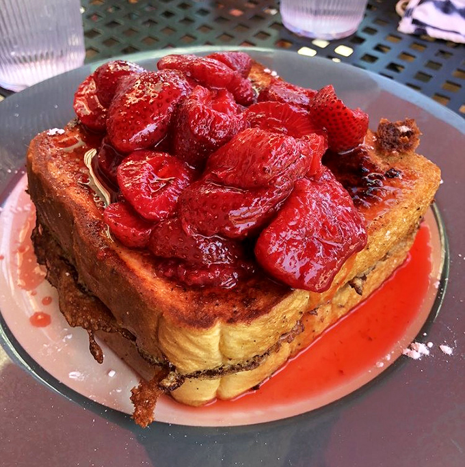 Stuffed French toast crowned with strawberries, because sometimes breakfast deserves to wear its Sunday best.