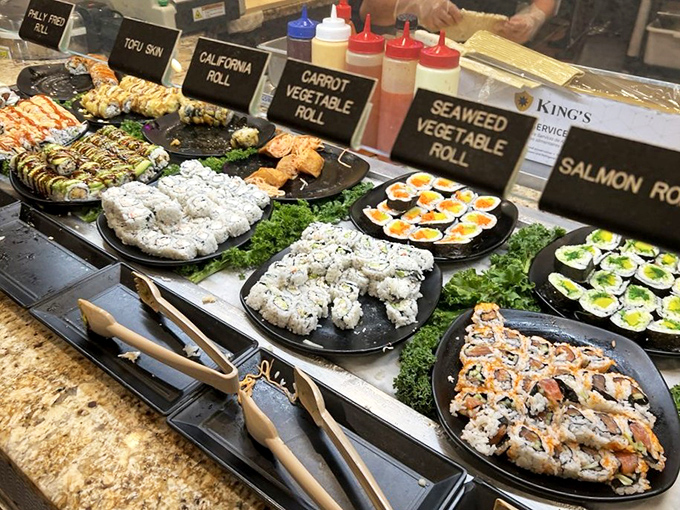 An array of sushi rolls lined up like colorful edible art&mdash;proof that "all-you-can-eat" and "actually fresh" can peacefully coexist in the buffet universe.