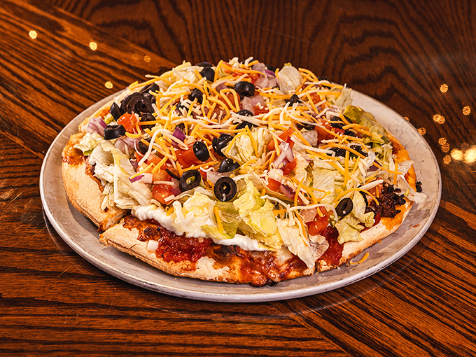 Taco pizza that breaks all the rules and gets away with it&mdash;a rebellious fusion that somehow makes perfect sense after the first bite.
