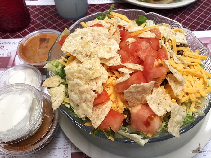 This taco salad towers with fresh ingredients, proving healthy can be hearty and absolutely delicious.