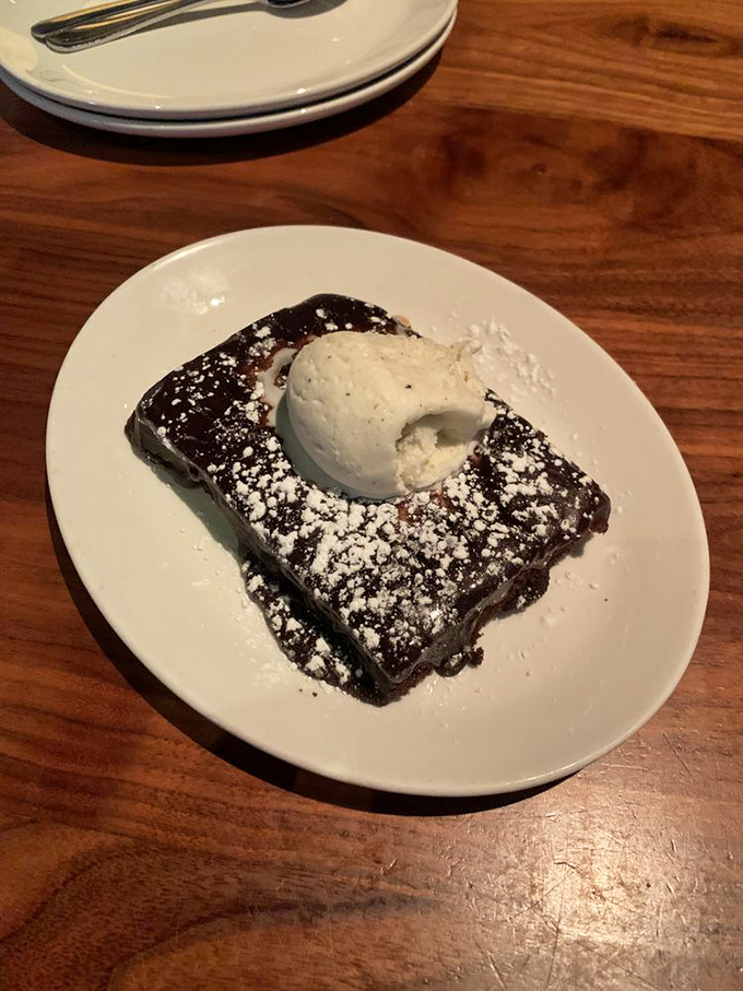 Chocolate decadence that demands a moment of respectful silence before diving in. That scoop of vanilla ice cream is melting with anticipation.