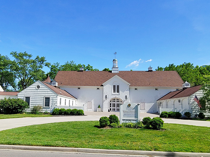 The Barn's pristine white clapboard and cupola offer a different architectural note in Mariemont's symphony of styles.