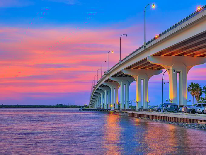 The Frank A. Wacha Bridge at sunset proves that even mundane infrastructure can become magical when Florida's sky decides to show off. 