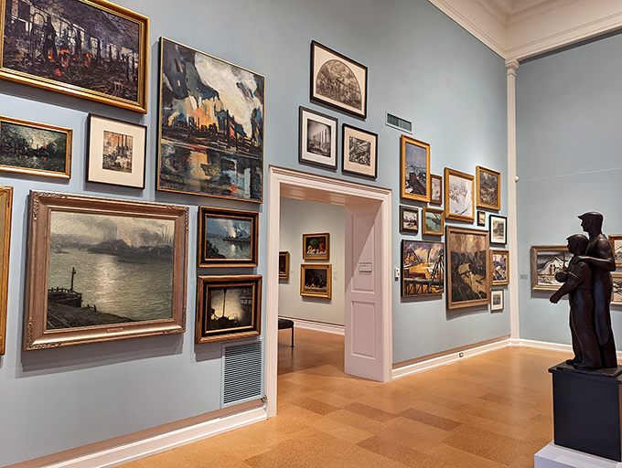 Inside the Westmoreland Museum, artwork creates a conversation across centuries, where industrial landscapes hang like windows into Pennsylvania's storied past.