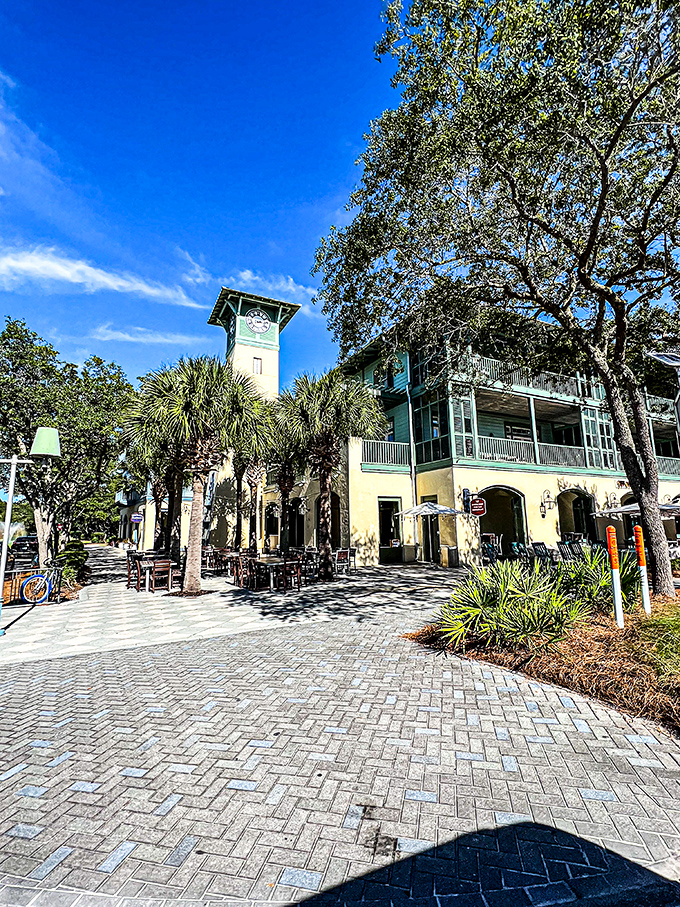 Seaside's town center combines shade trees and brick pathways to create the perfect afternoon strolling venue. That clock tower isn't just keeping time—it's keeping traditions.
