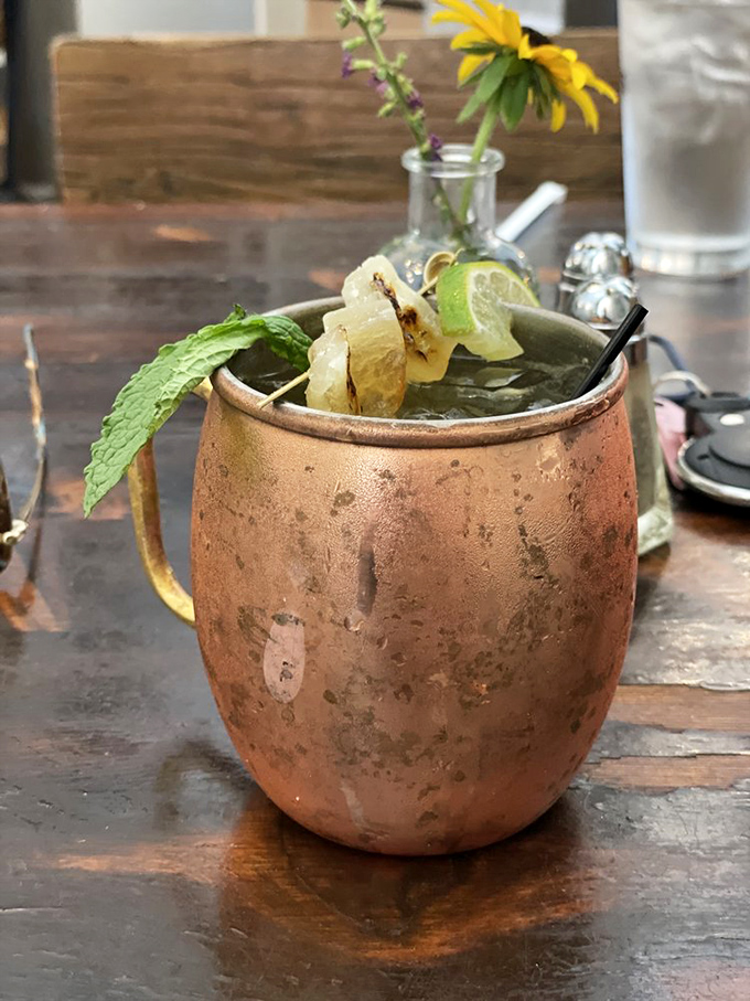 A Moscow Mule gets the Midwest treatment in this copper beauty. The fresh mint and lime provide the perfect counterpoint to whatever Missouri weather throws your way.