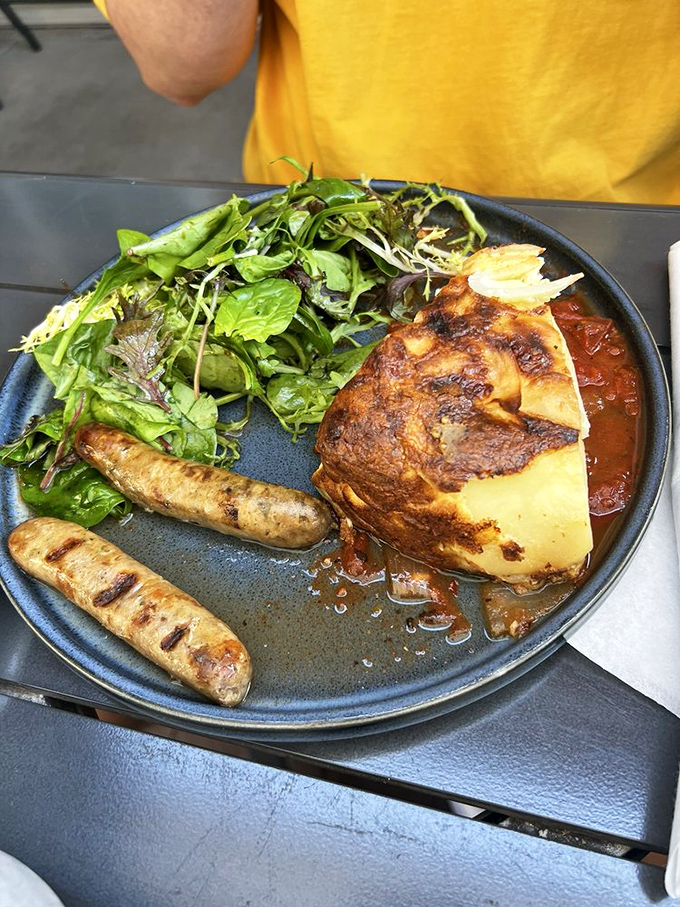 The vibrant orange hue of this chorizo scramble practically sings "good morning" louder than your most enthusiastic rooster.