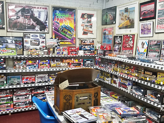 NASCAR meets nostalgia in this corner where vintage toy cars and an antique record player remind us that entertainment was once wonderfully tangible.
