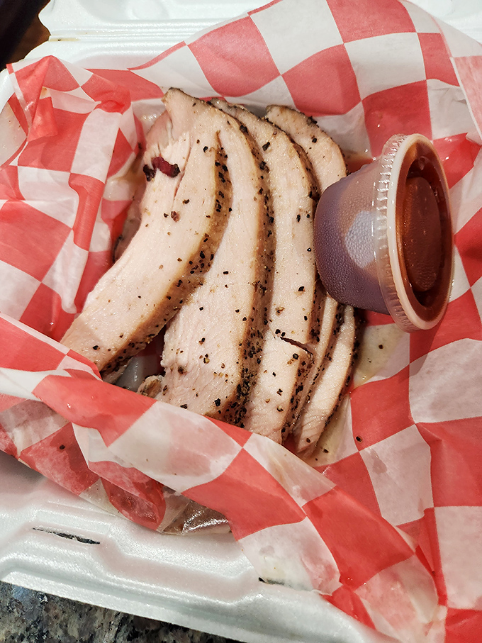 Turkey breast that defies the "dry poultry" curse. These smoke-kissed slices prove that Thanksgiving shouldn't have a monopoly on great turkey.