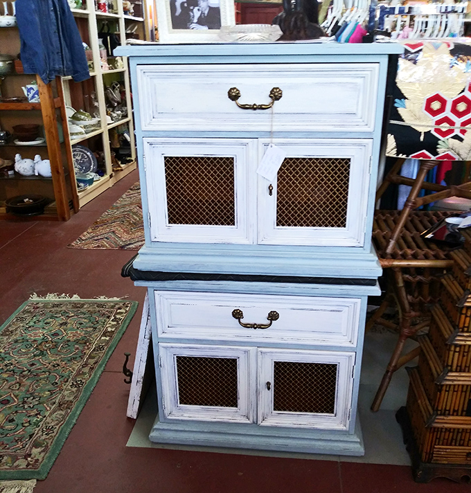 This shabby-chic cabinet with brass hardware and mesh inserts isn't just furniture&mdash;it's the statement piece your grandmother wishes she'd kept.
