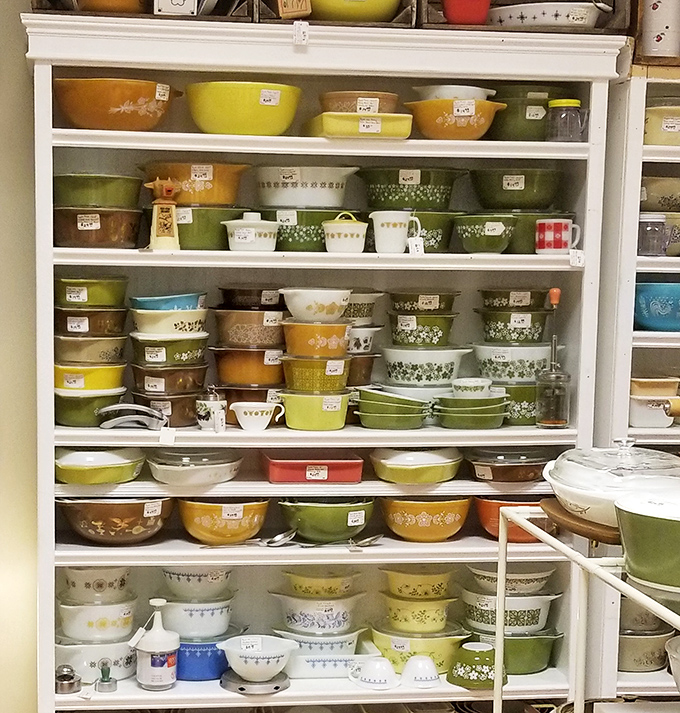 The legendary Pyrex rainbow in its natural habitat. These bowls have witnessed more family recipes than a cooking show marathon.
