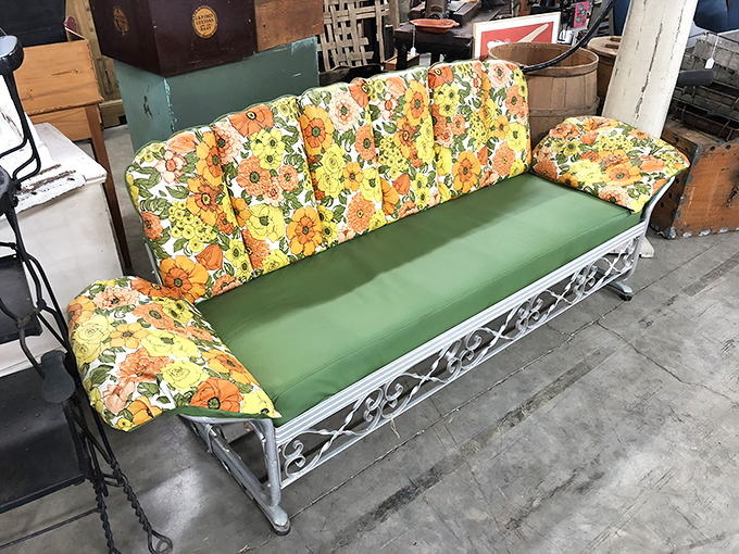 That floral-cushioned glider isn't just outdoor furniture&mdash;it's a time machine to summer evenings when neighbors actually talked to each other.