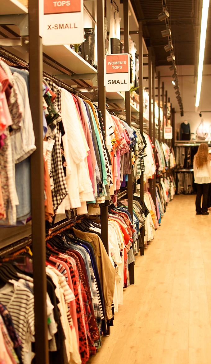 Organization that Marie Kondo would approve&mdash;color-coded tops waiting to spark joy in your closet and budget.