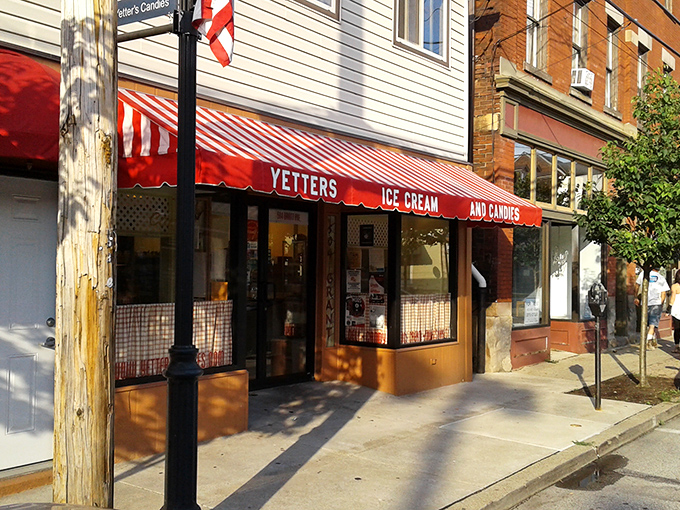 Yetter's Ice Cream and Candies serves up sweet nostalgia under classic red-and-white awnings, where every scoop comes with a side of small-town charm.