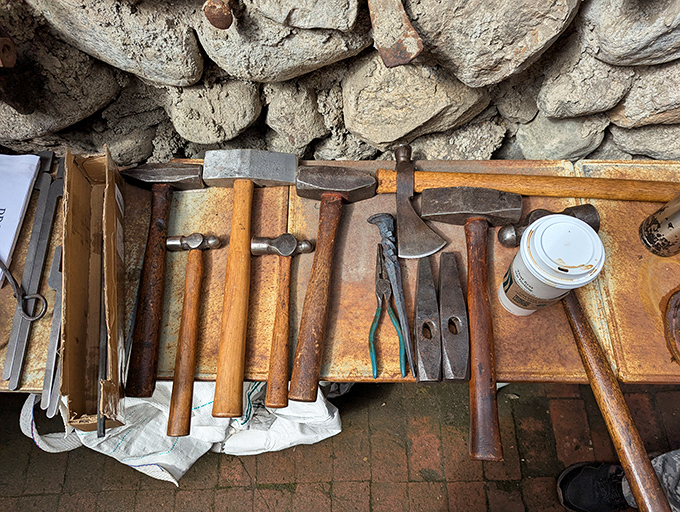 The tools that built a dream. This collection of vintage implements represents countless hours of labor that transformed vision into reality.