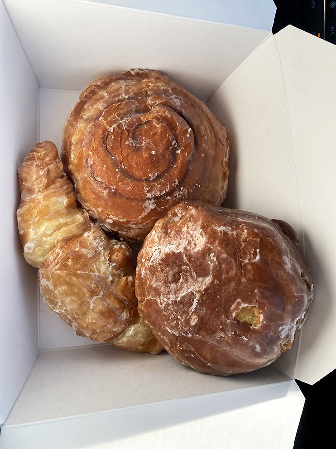 These pastries aren't just baked goods; they're morning motivation in physical form, glistening with possibility and sugar glaze.