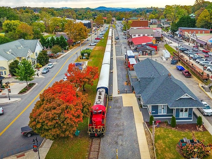 A bird's-eye view reveals how the railway threads through downtown Blue Ridge like a steel needle stitching together past and present.