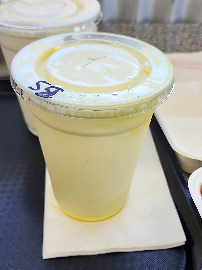 The banana shake sits innocently in its cup, pretending it's not about to become the highlight of someone's entire week.