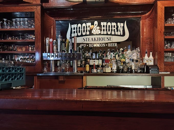 Behind this bar, bottles stand at attention like soldiers ready to serve. The mirror reflects decades of celebrations and consolations.