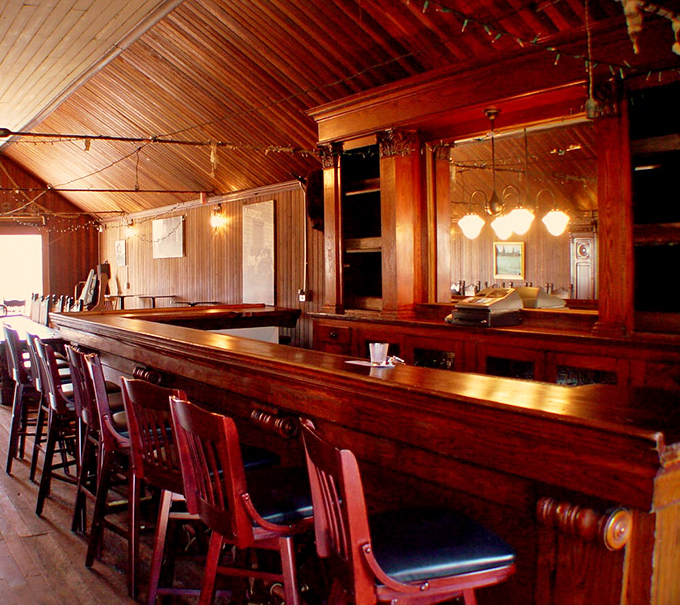 This isn't just a bar – it's a time machine with polished wood and vintage fixtures that whisper tales of coastal celebrations past.