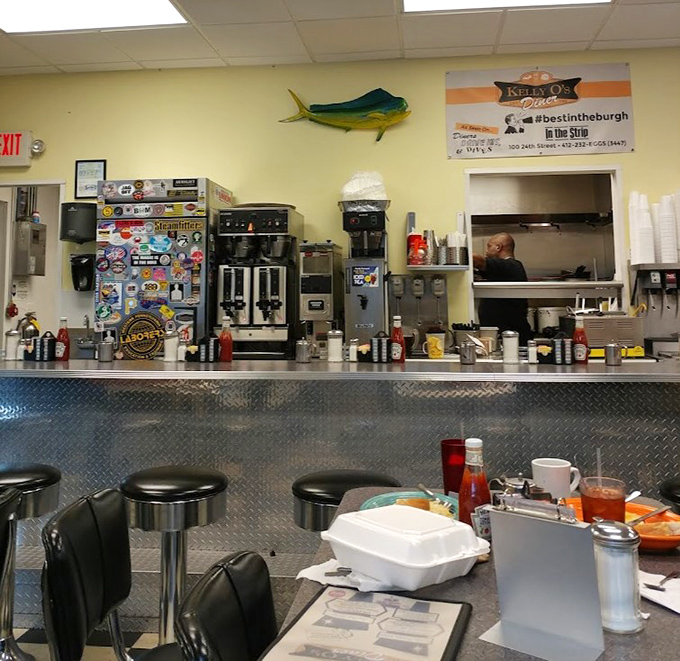 Behind every great diner is a counter that tells stories. This one, with its mounted fish and Pittsburgh pride, speaks volumes.